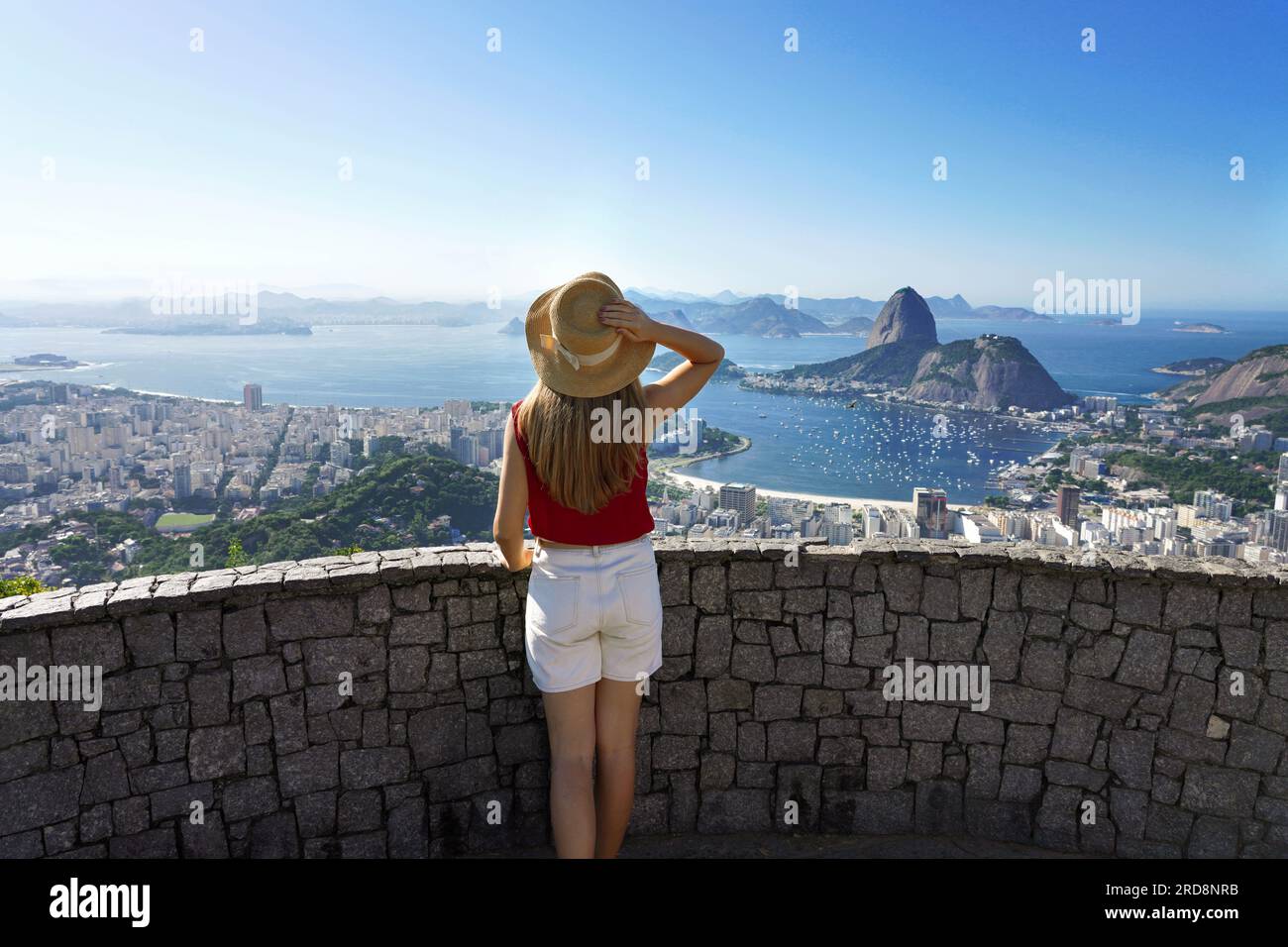 Travel in Rio de Janeiro, Brazil. Rear view of tourist girl enjoying ...