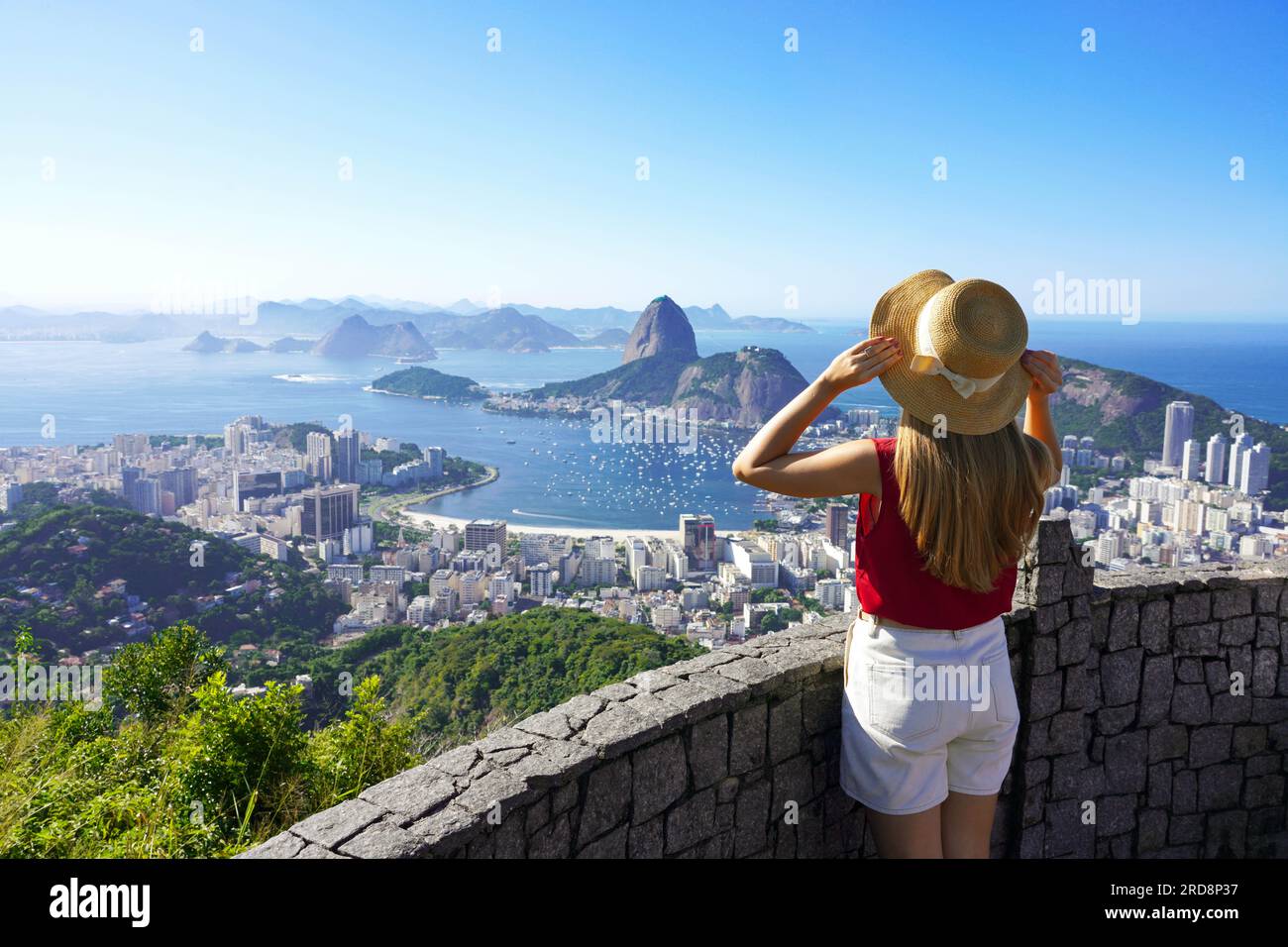Holidays in Rio de Janeiro. Rear view of tourist woman enjoying sight ...