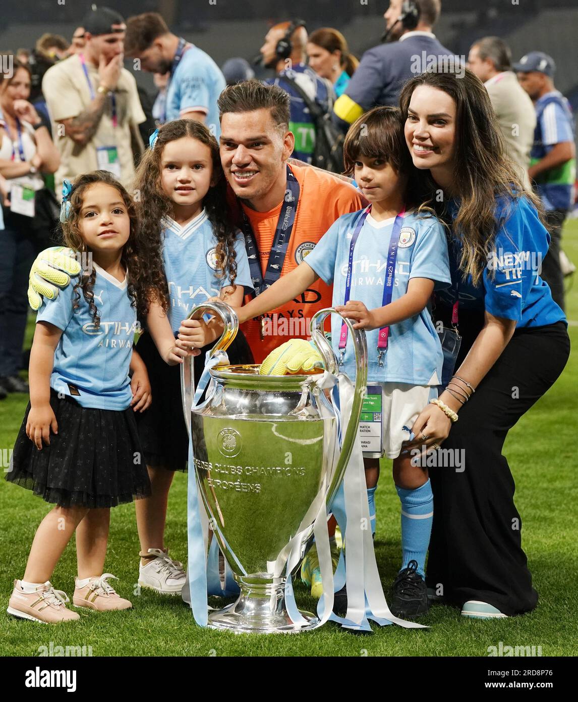 Manchester City goalkeeper Ederson poses for a photo with the Champions ...