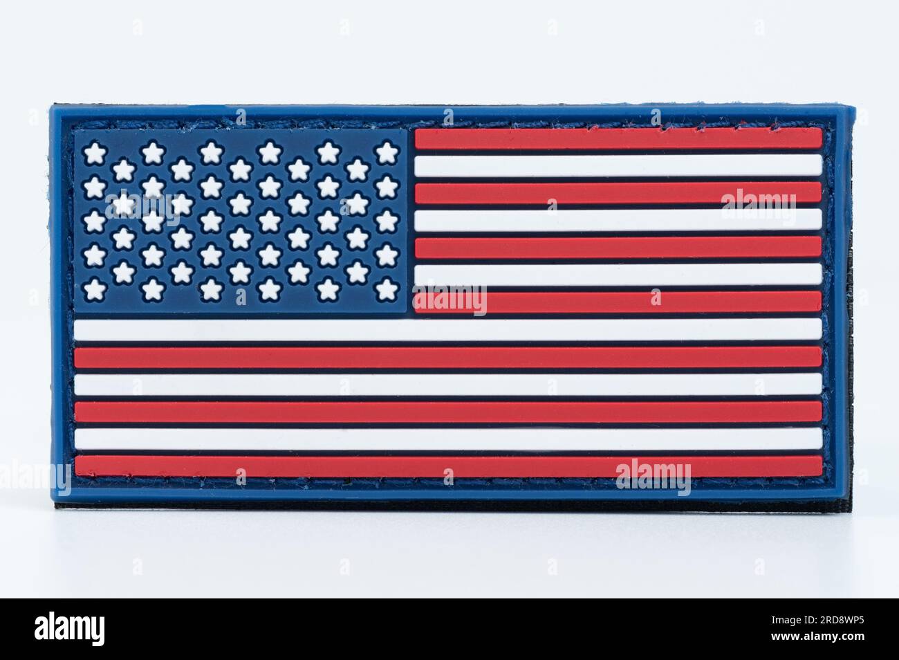 American flag label with stitches isolated on white studio background ...