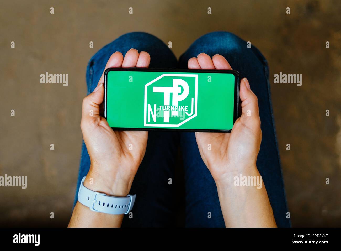 In this photo illustration, the New Jersey Turnpike Authority (NJTA) logo is seen displayed on a ...