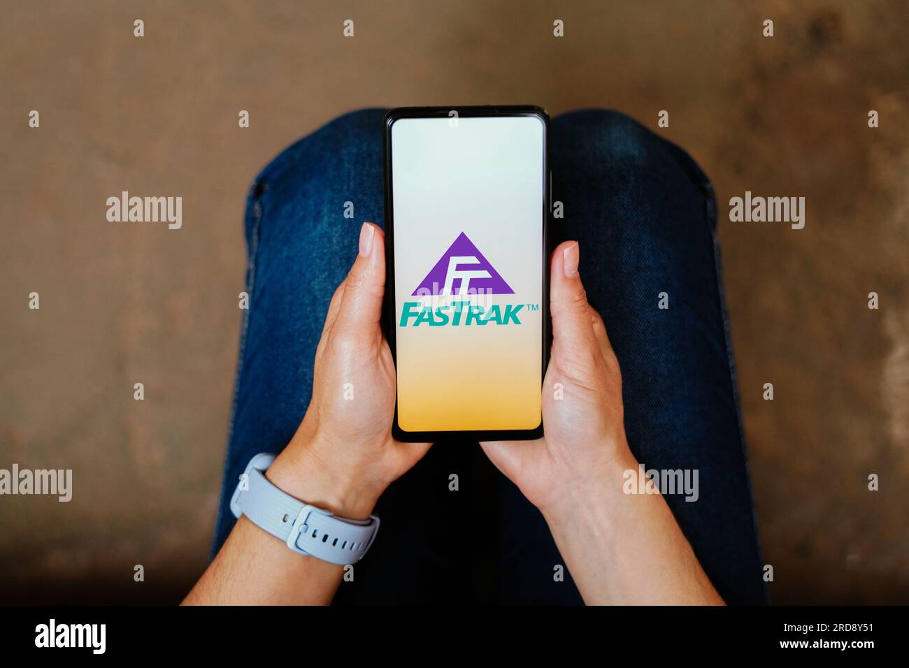 In this photo illustration, the FasTrak logo is seen displayed on a ...