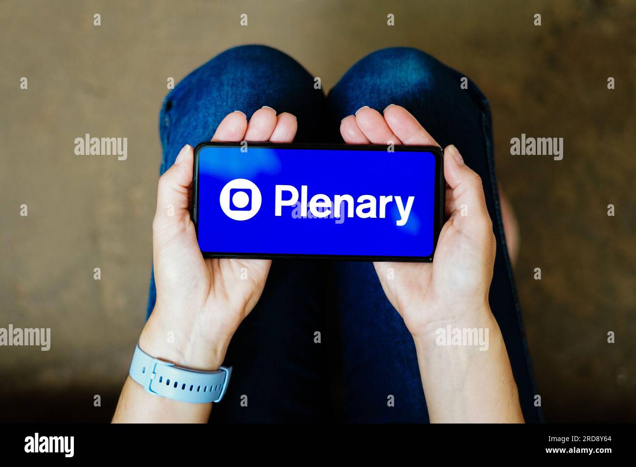 In this photo illustration, the Plenary Group logo is seen displayed on ...