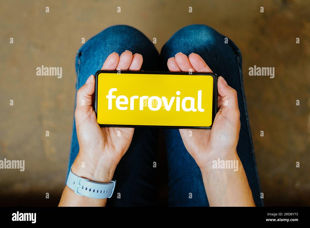 In this photo illustration, the Ferrovial logo is seen displayed on a ...