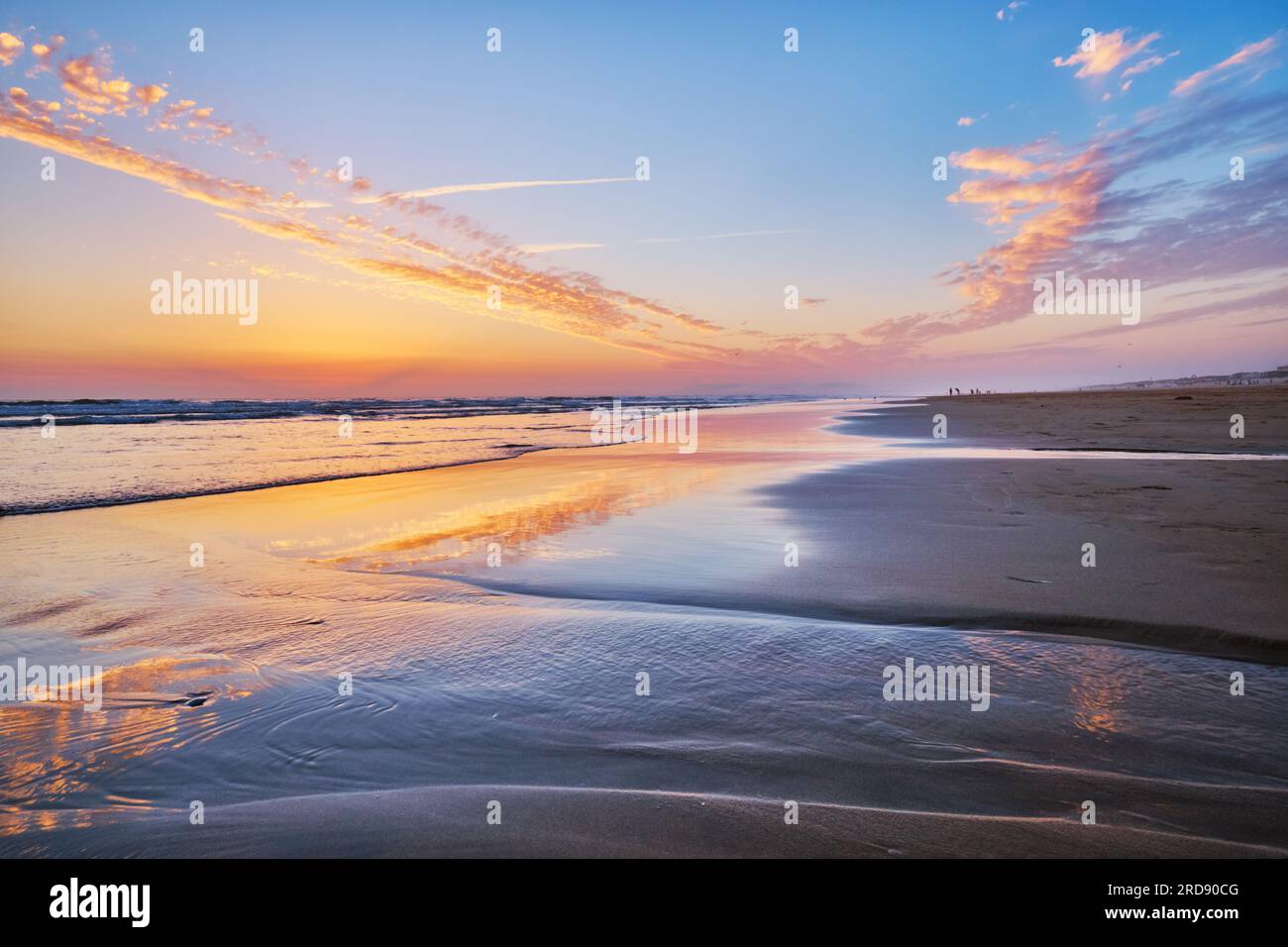 Atlantic ocean sunset with surging waves at Fonte da Telha beach ...