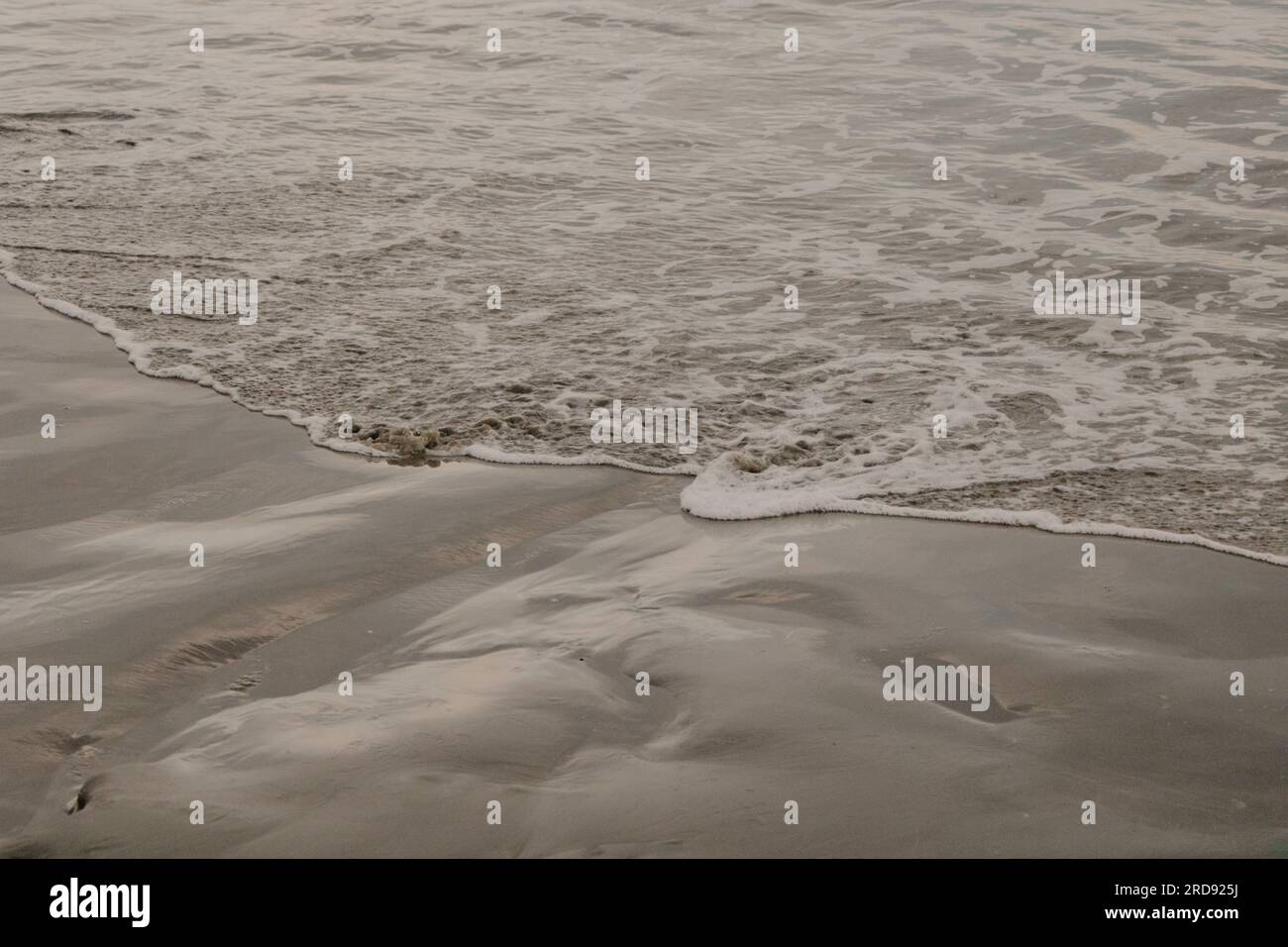calm waves at the beach Stock Photo - Alamy