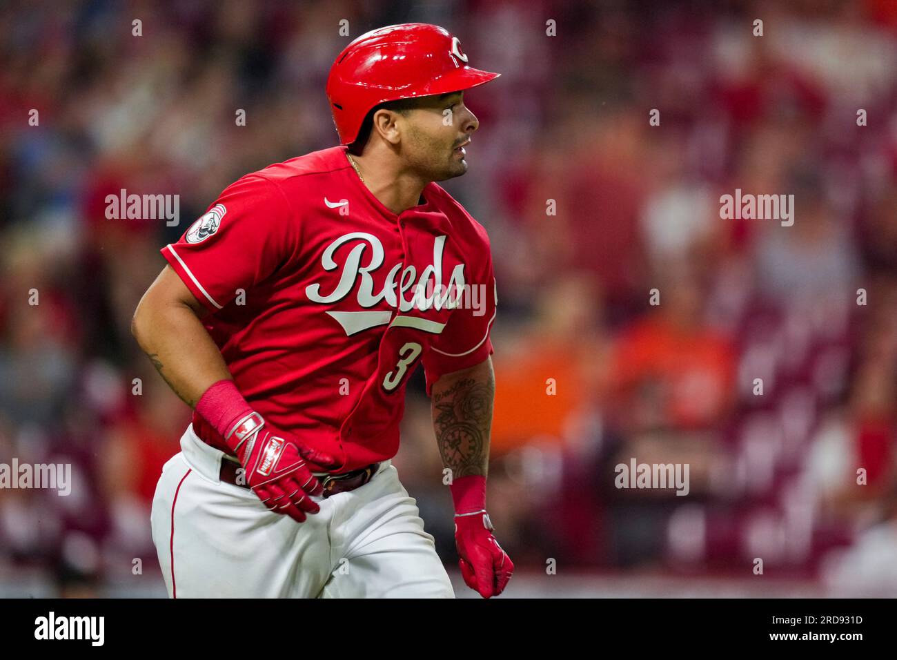 Cincinnati Reds' Christian Encarnacion-Strand runs to first base during ...