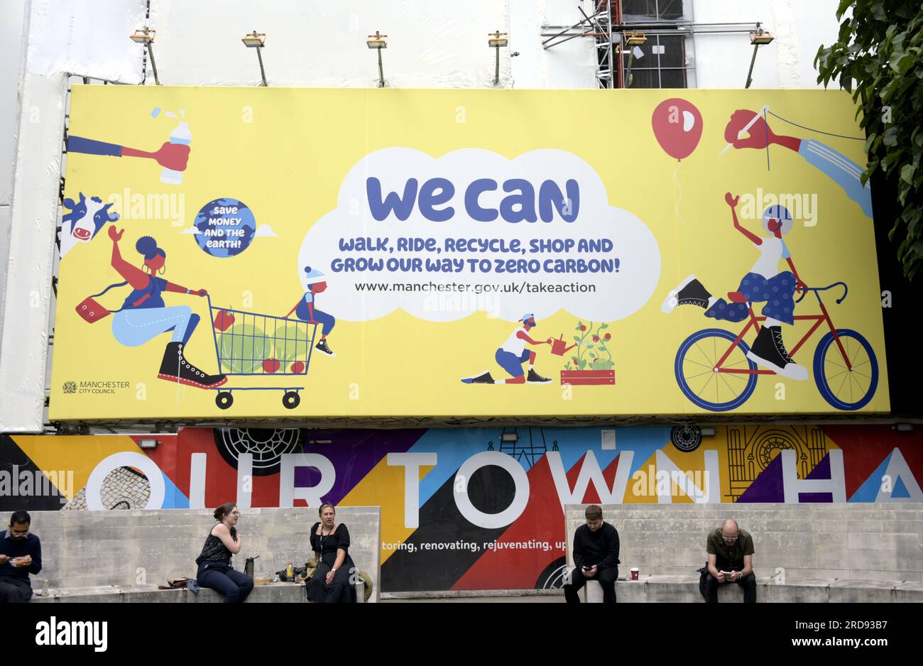 zero carbon sign and sign about the renovation of the town hall in ...