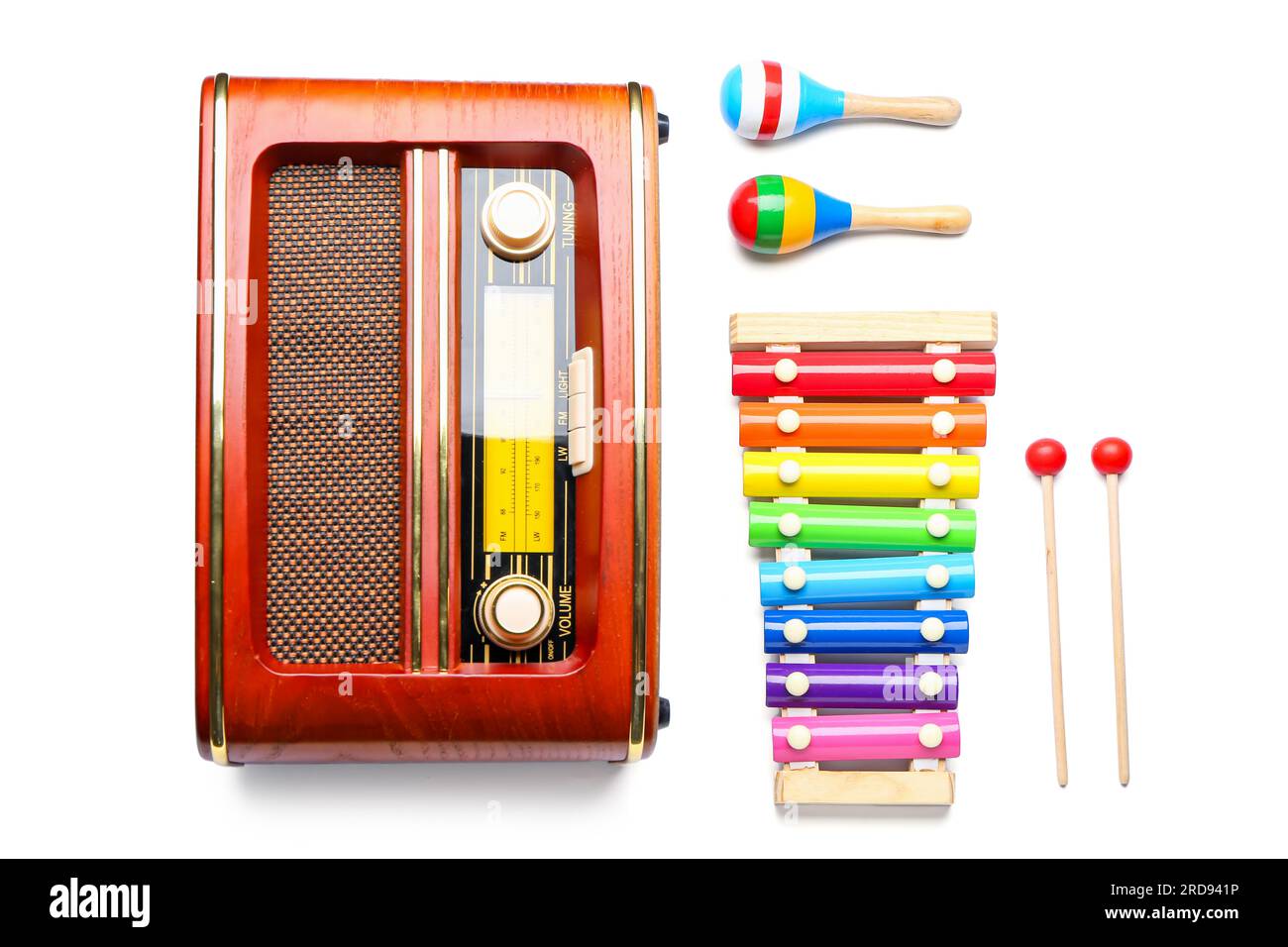Different musical instruments and retro radio receiver on white ...