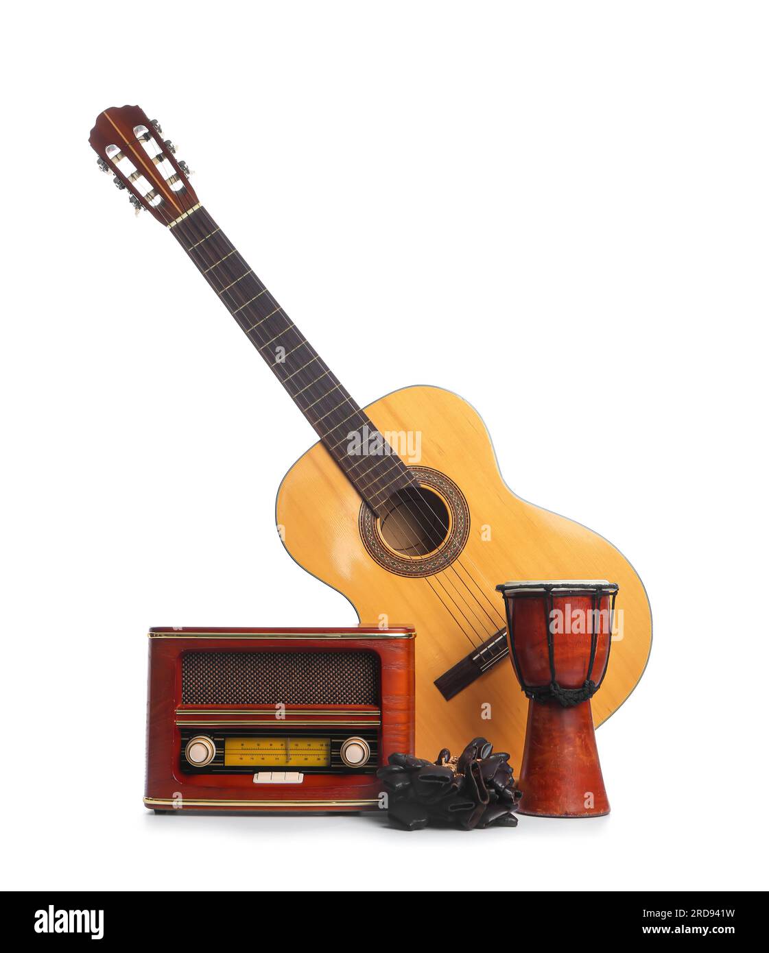 Different musical instruments and retro radio receiver on white ...