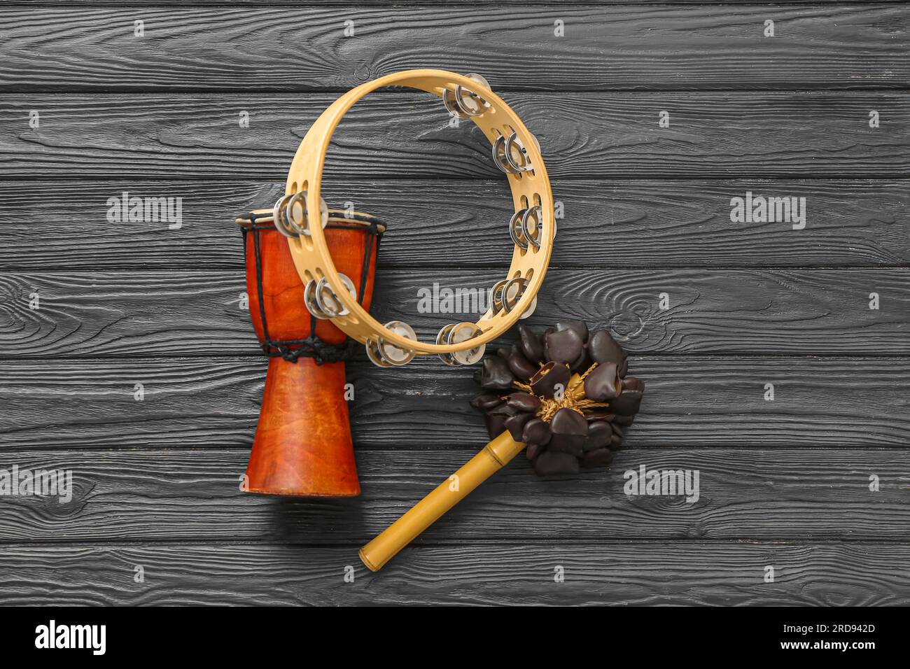 Different musical instruments on wooden background Stock Photo - Alamy