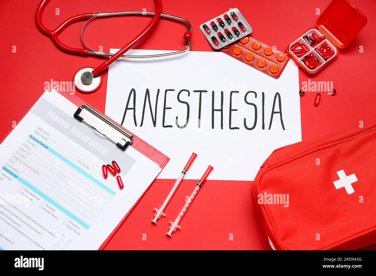 Paper with word ANESTHESIA and medical supplies on red background Stock ...