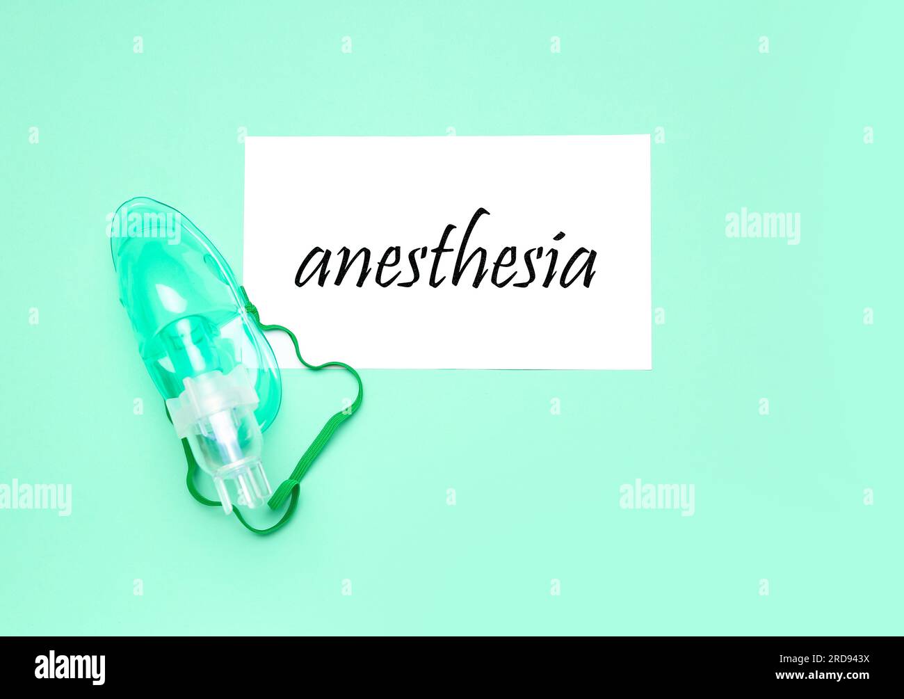 Paper with word ANESTHESIA and oxygen mask on green background Stock ...