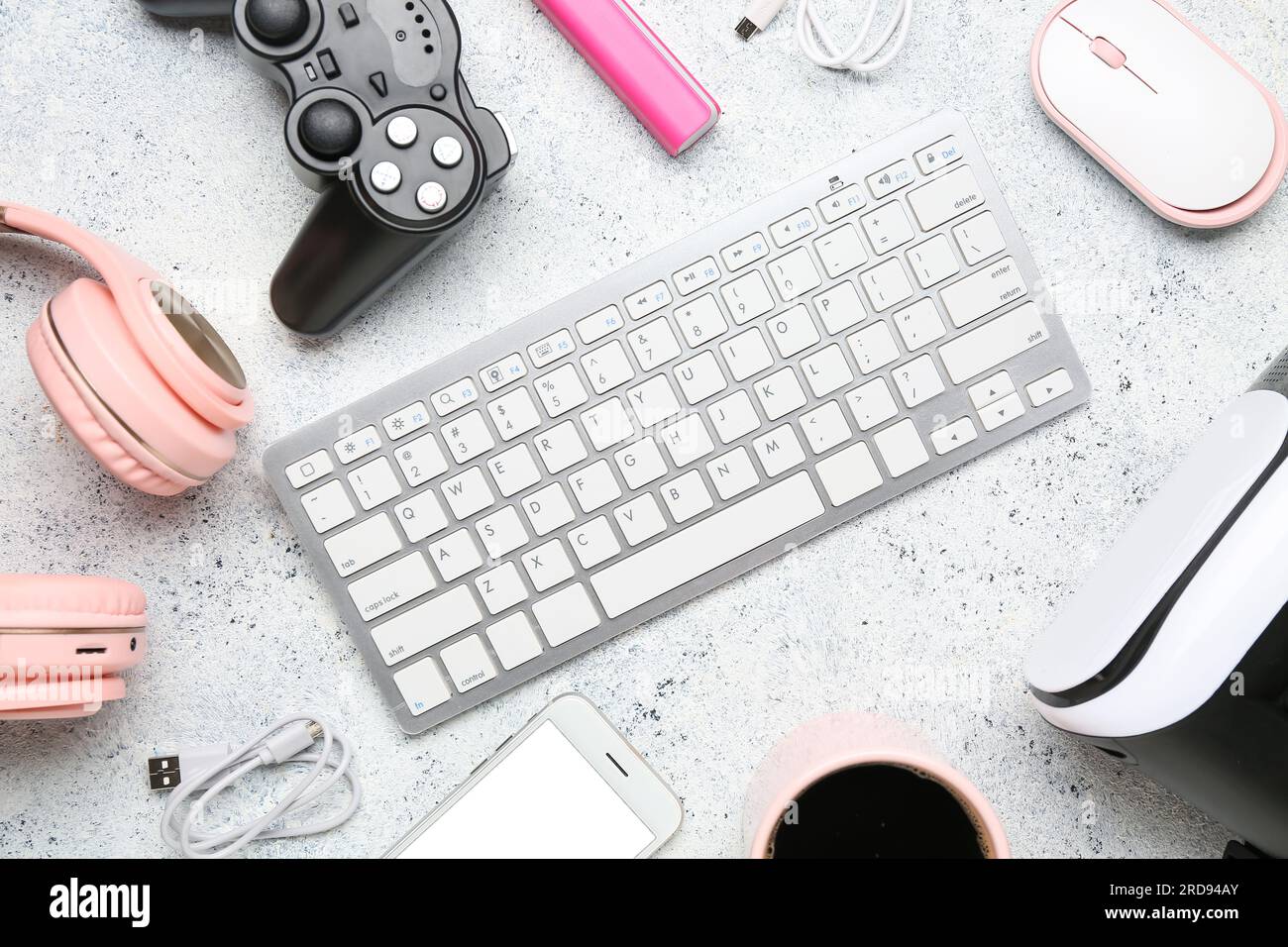 Composition with modern gadgets on light background Stock Photo - Alamy