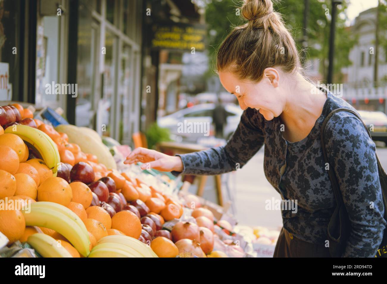 Laughing market woman melon hi-res stock photography and images - Alamy
