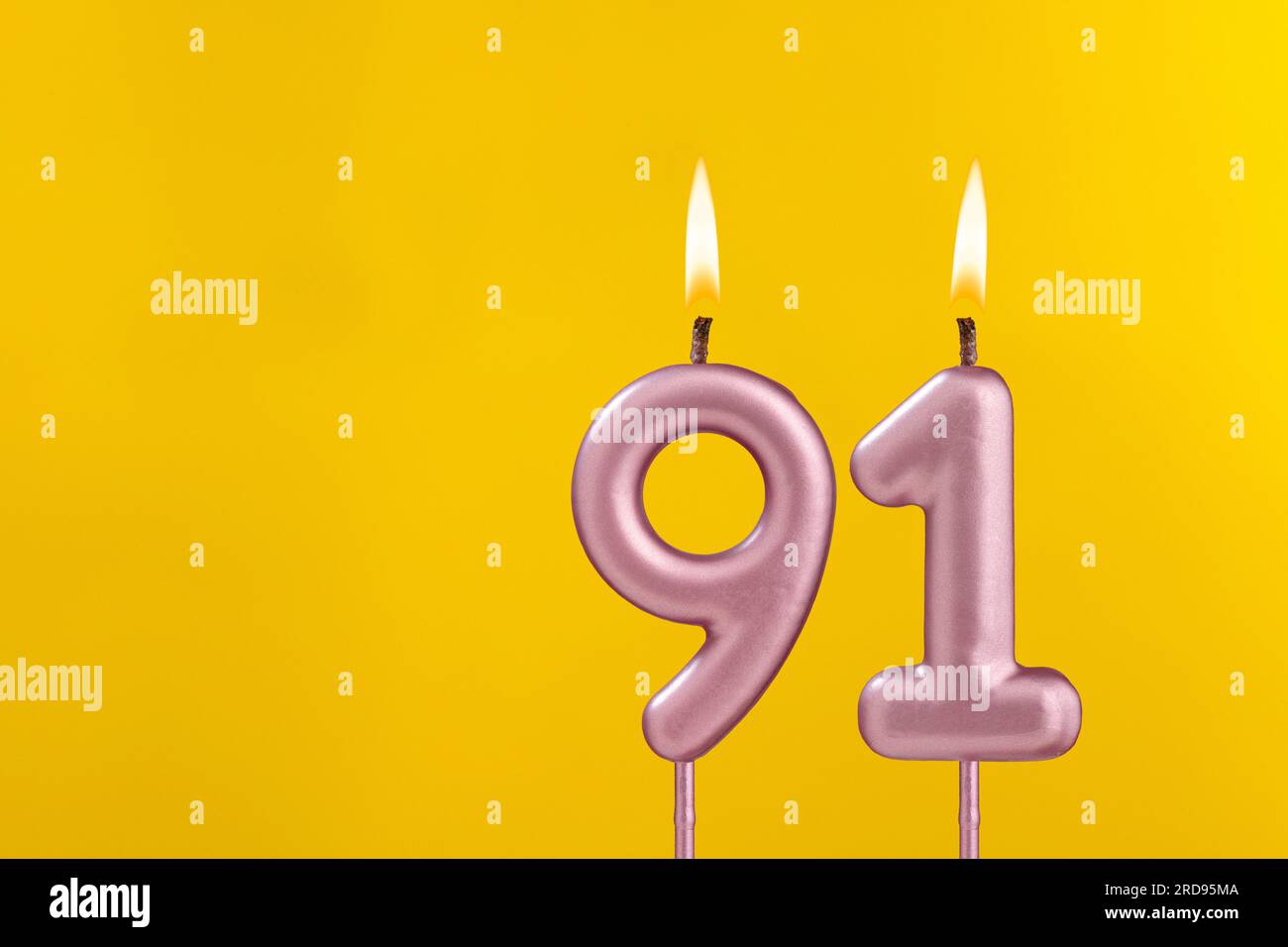 Birthday candle number 91 - Birthday celebration on yellow background ...