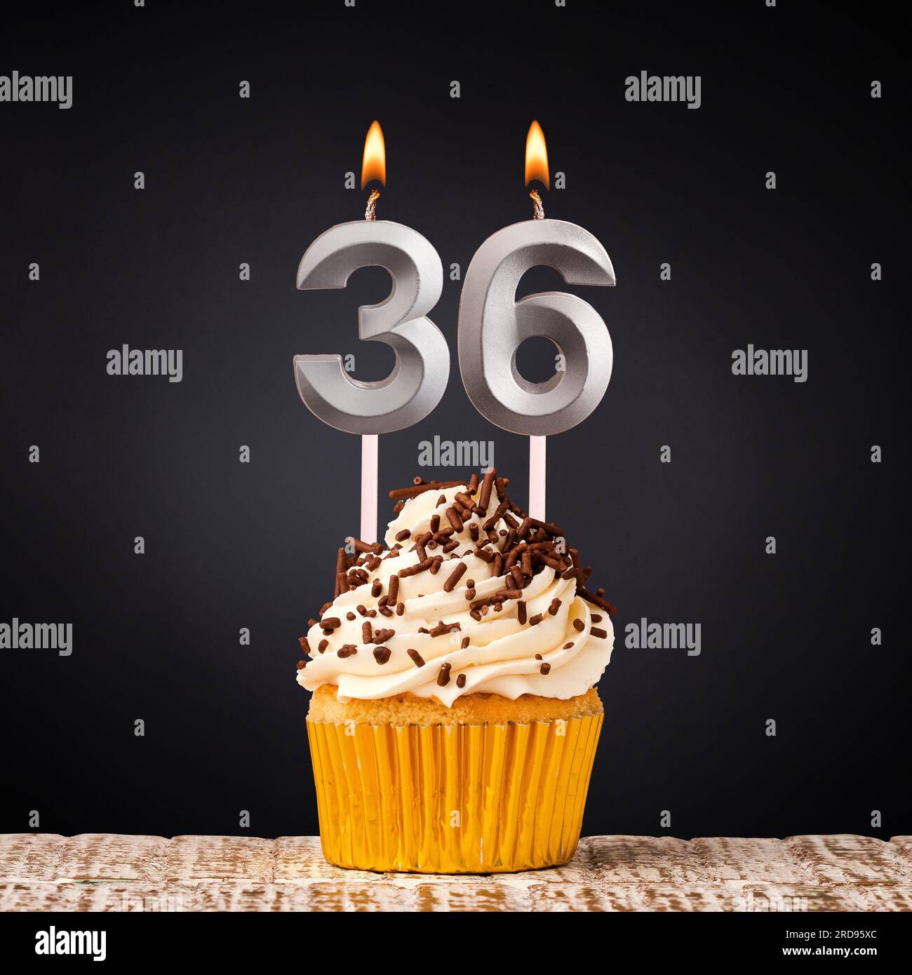 birthday cupcake with number 36 candle - Celebration on dark background ...