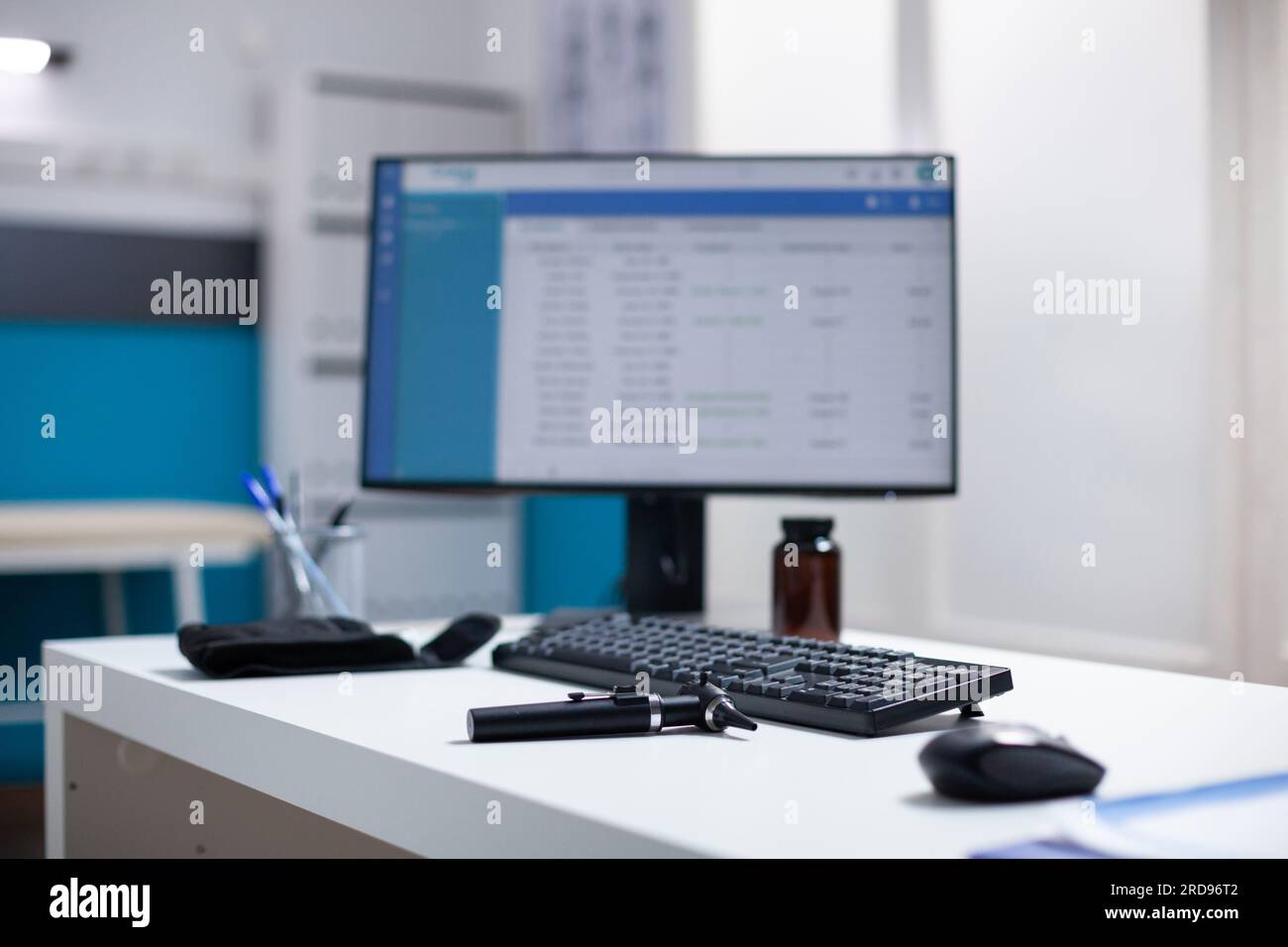Modern hospital office with computer monitor showing treatment ...