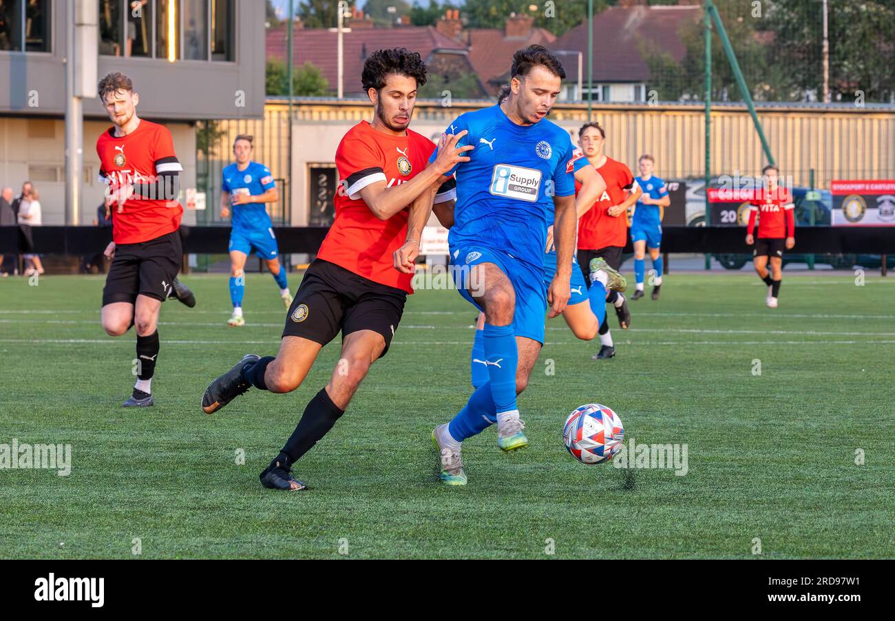 Warrington Rylands player Scott Bakkor controls the football under ...