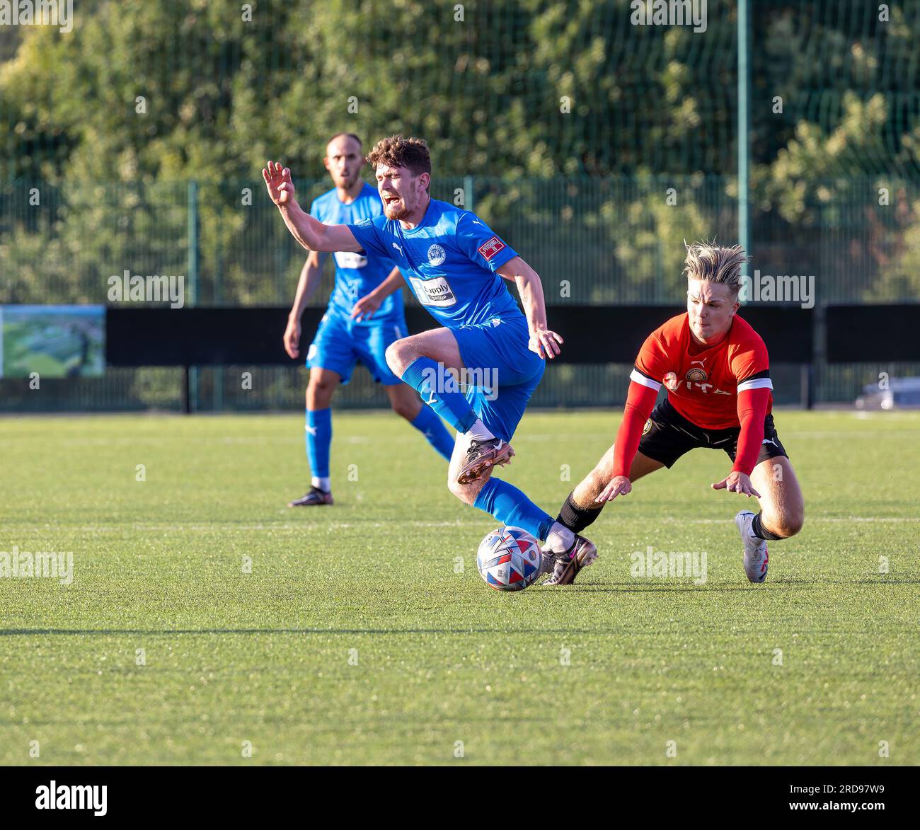 Warrington Rylands player James Neild cries in pain after a tackle by a ...