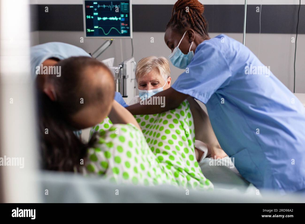 Woman delivery baby in hospital ward, screaming and pushing during ...