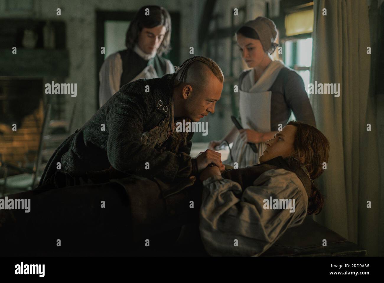 OUTLANDER, foreground from left: John Bell, Charles Vandervaart, back ...