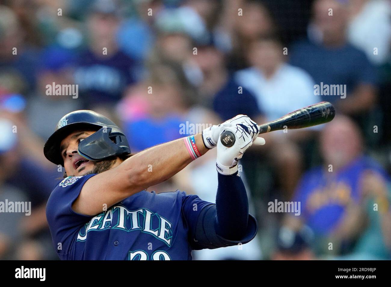 Seattle Mariners' Eugenio Suarez follows through against the Minnesota ...