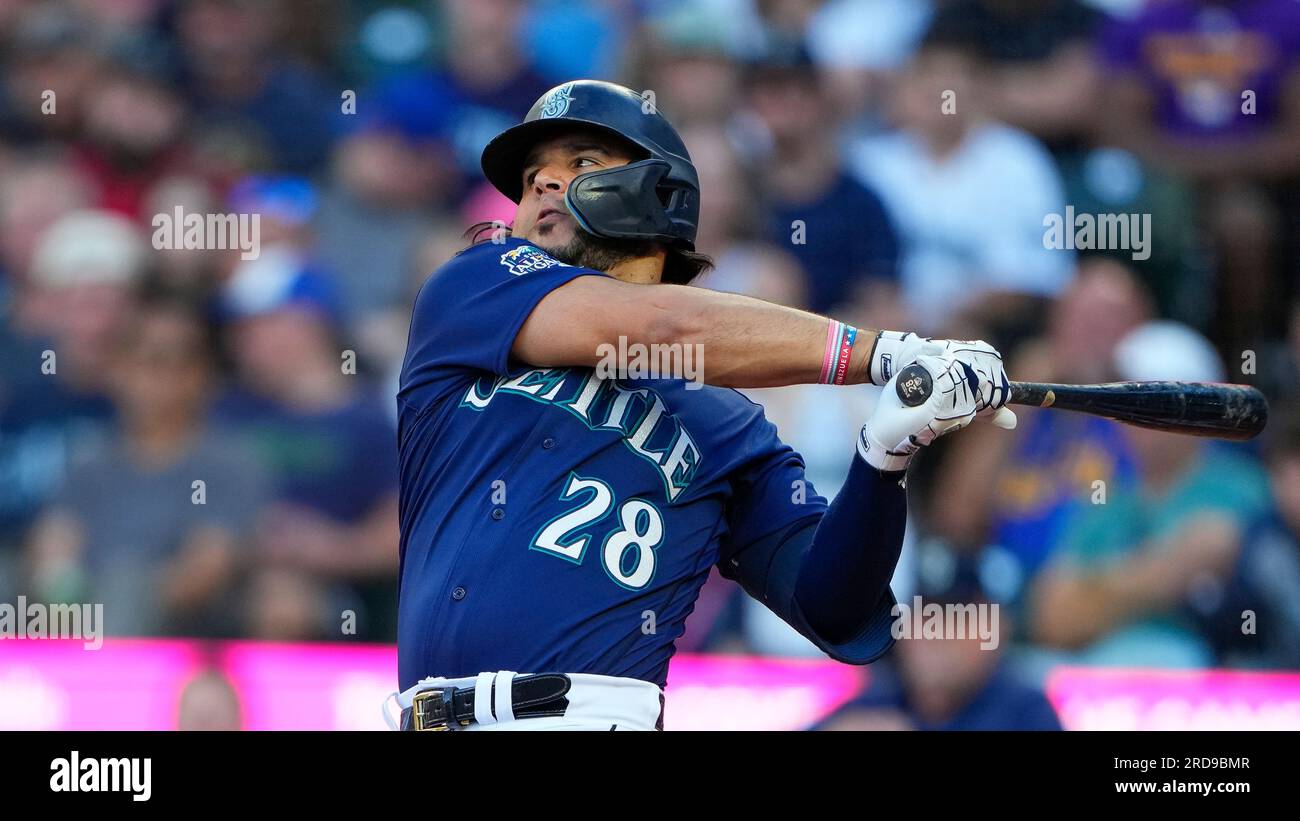 Seattle Mariners' Eugenio Suarez follows through against the Minnesota ...