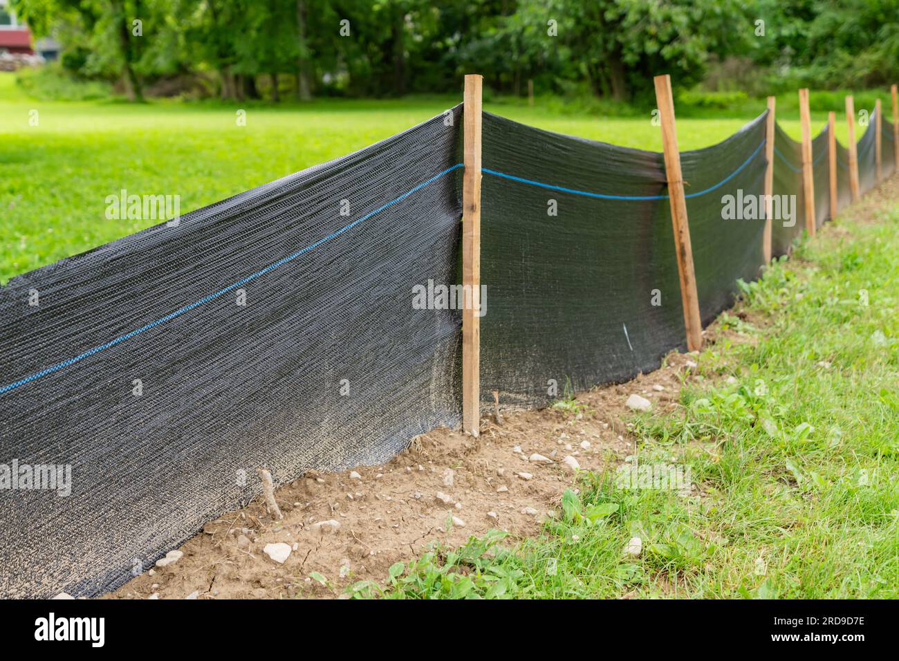 Silt Fence fabric with wooden posts installed prior to the start of ...