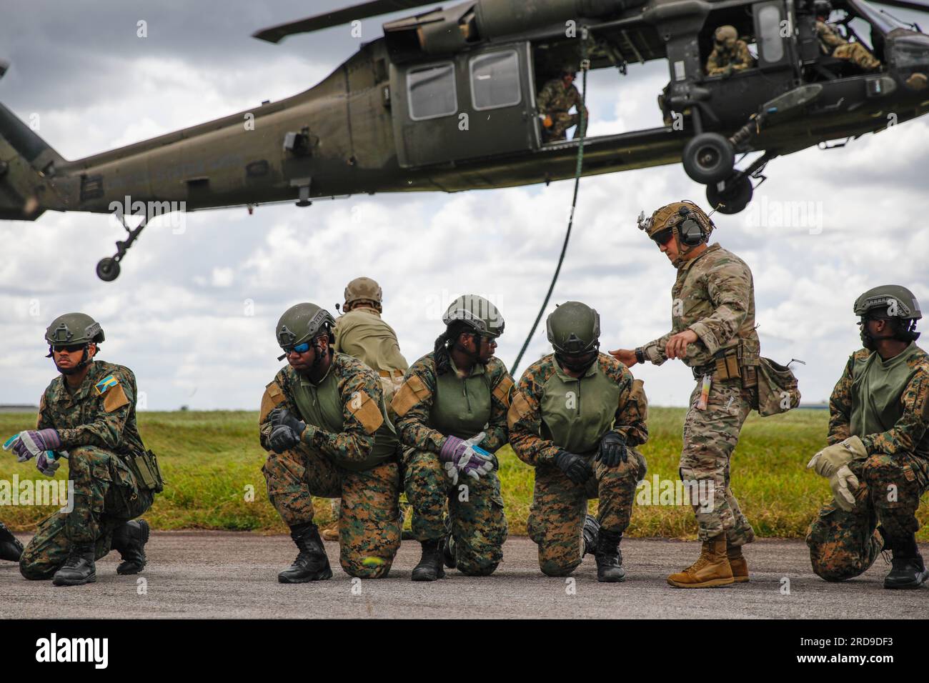 Military members from seven countries conducted Fast Rope Insertion and ...