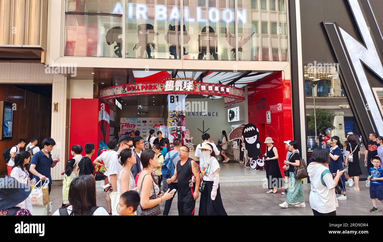 SHANGHAI, CHINA - JULY 18, 2023 - Tourists visit the Nanjing Road ...