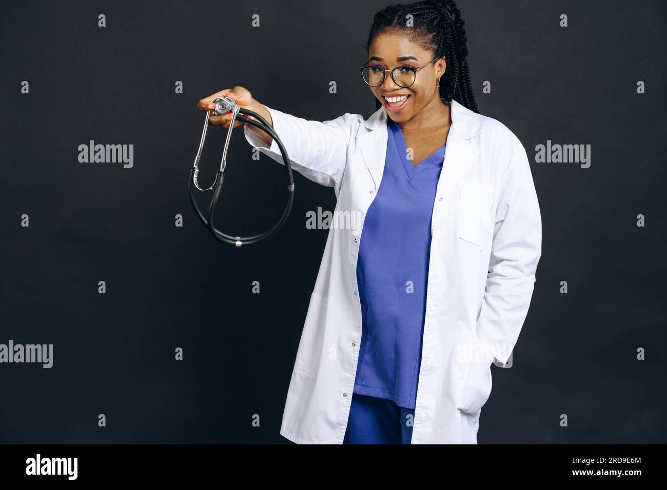 Doctor wearing scrubs stethoscope hi-res stock photography and images ...