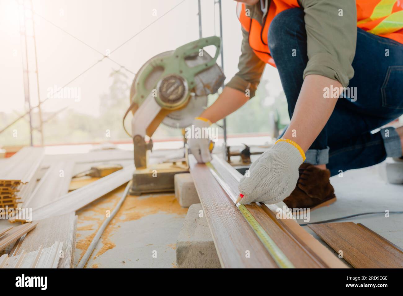 Structural worker dressed in safety gear and hard hat doing ...