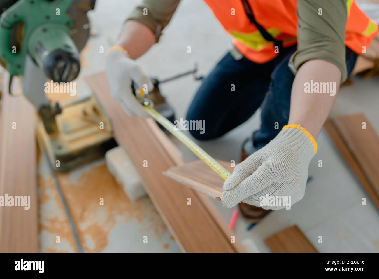 Structural worker dressed in safety gear and hard hat doing ...