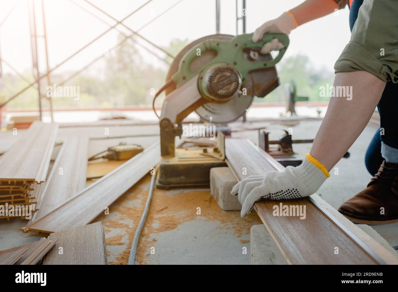 Structural worker dressed in safety gear and hard hat doing ...