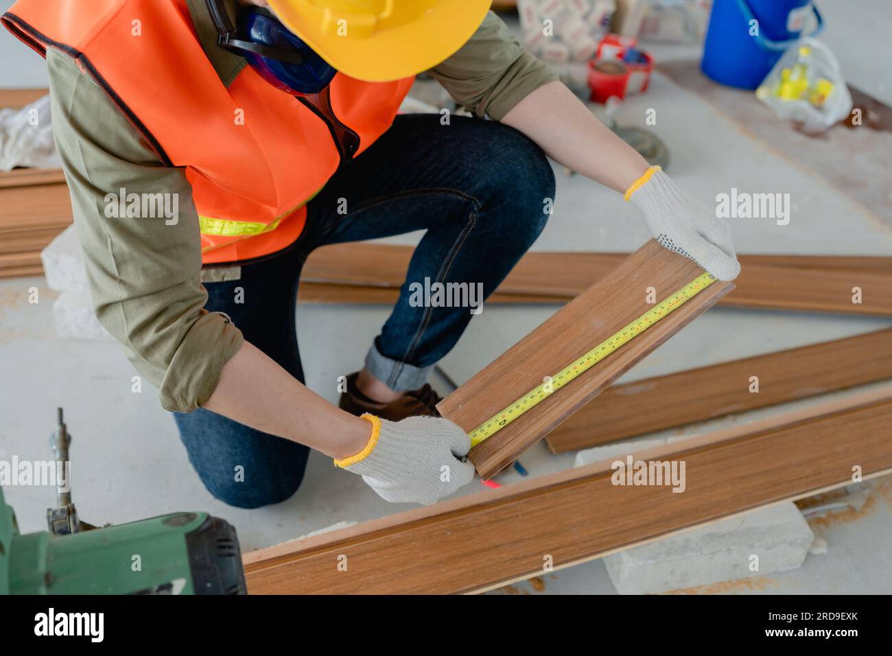 Structural worker dressed in safety gear and hard hat doing ...
