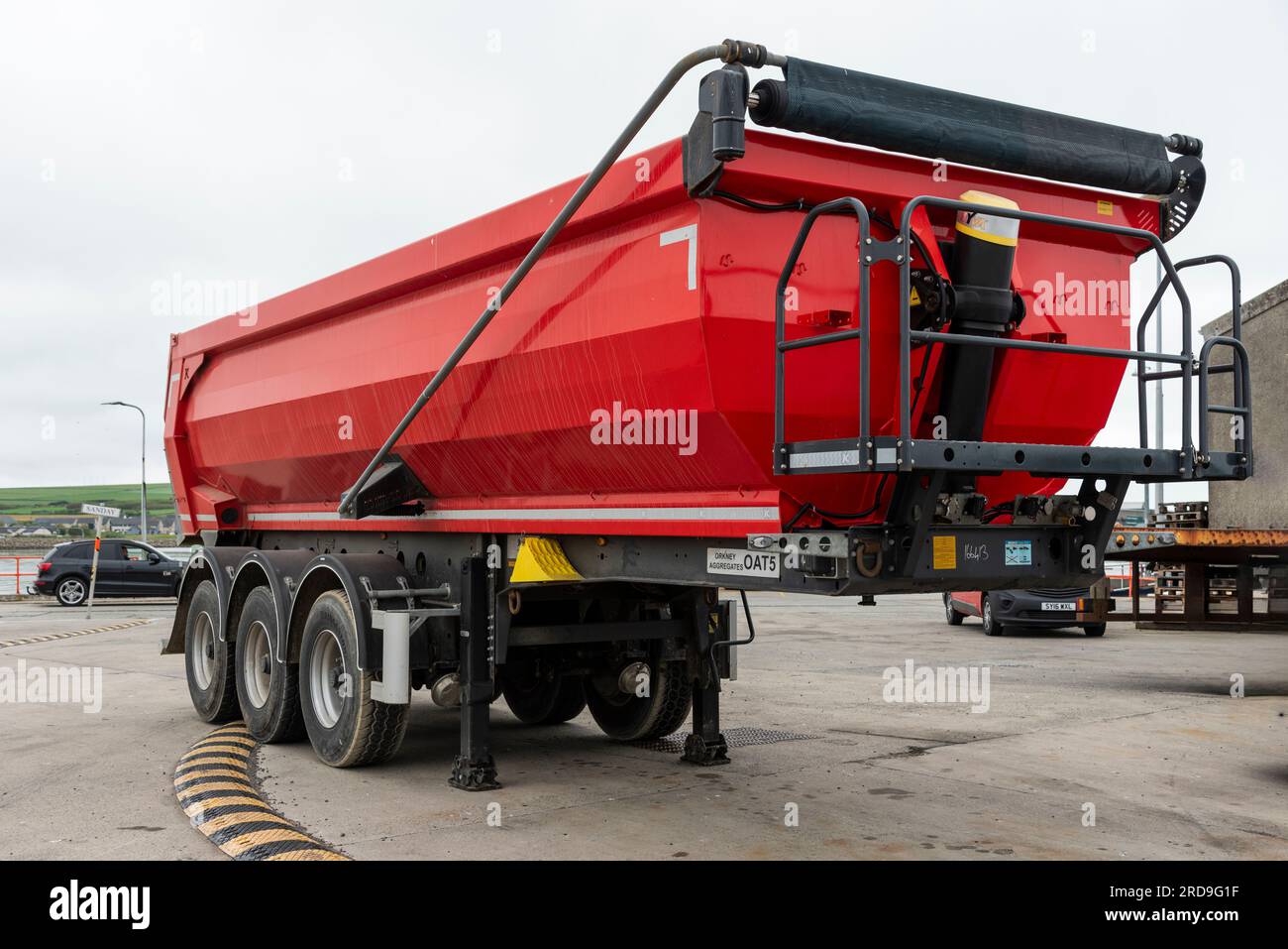 Kirkwall, Orkney Island, Scotland, UK. Large red painted tipper trailer ...