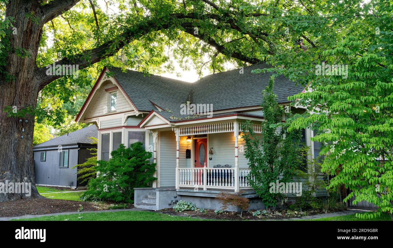 Rural home with a large tree in the front yard Stock Photo - Alamy