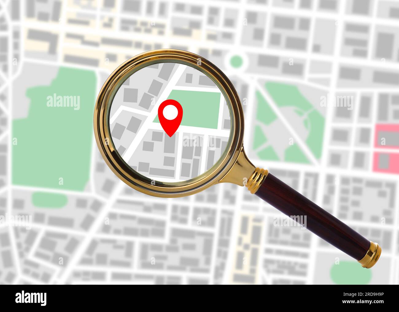 Red location marker on city map, view through magnifying glass Stock ...