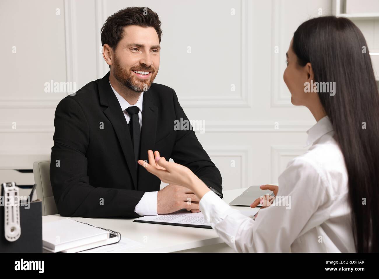 Human resources manager conducting job interview with applicant in office Stock Photo - Alamy