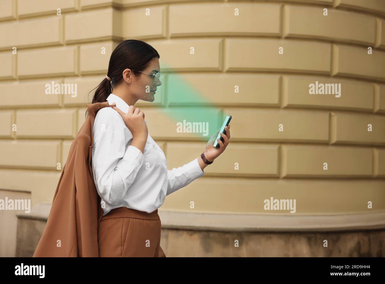 Woman Using Smartphone With Facial Recognition System On Street Security Application Scanning