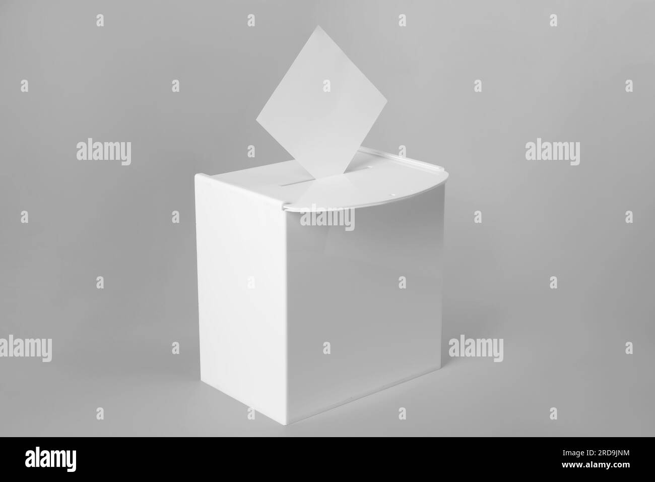 Ballot box with vote on light grey background. Election time Stock ...
