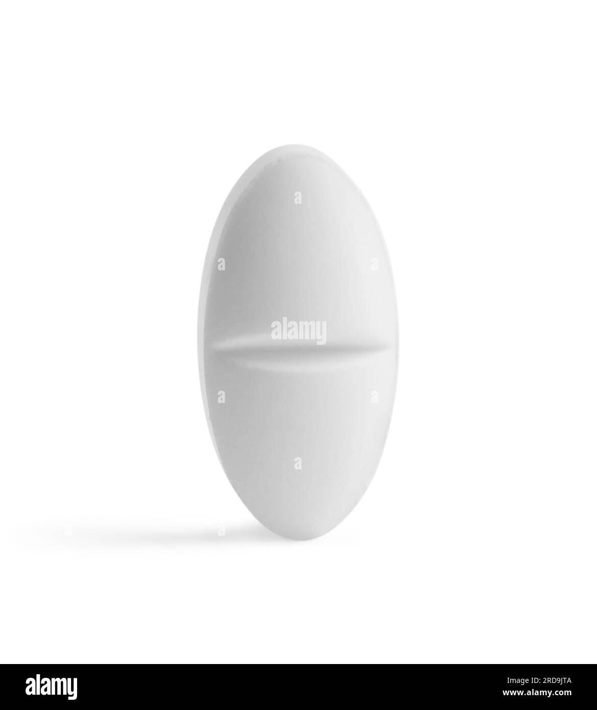 One pill on white background. Medicinal treatment Stock Photo - Alamy