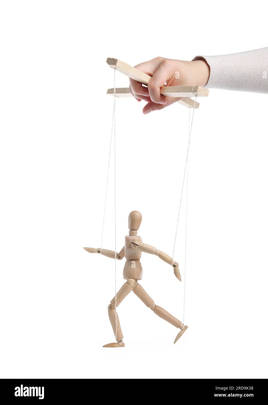 Woman pulling strings of puppet on white background, closeup Stock ...