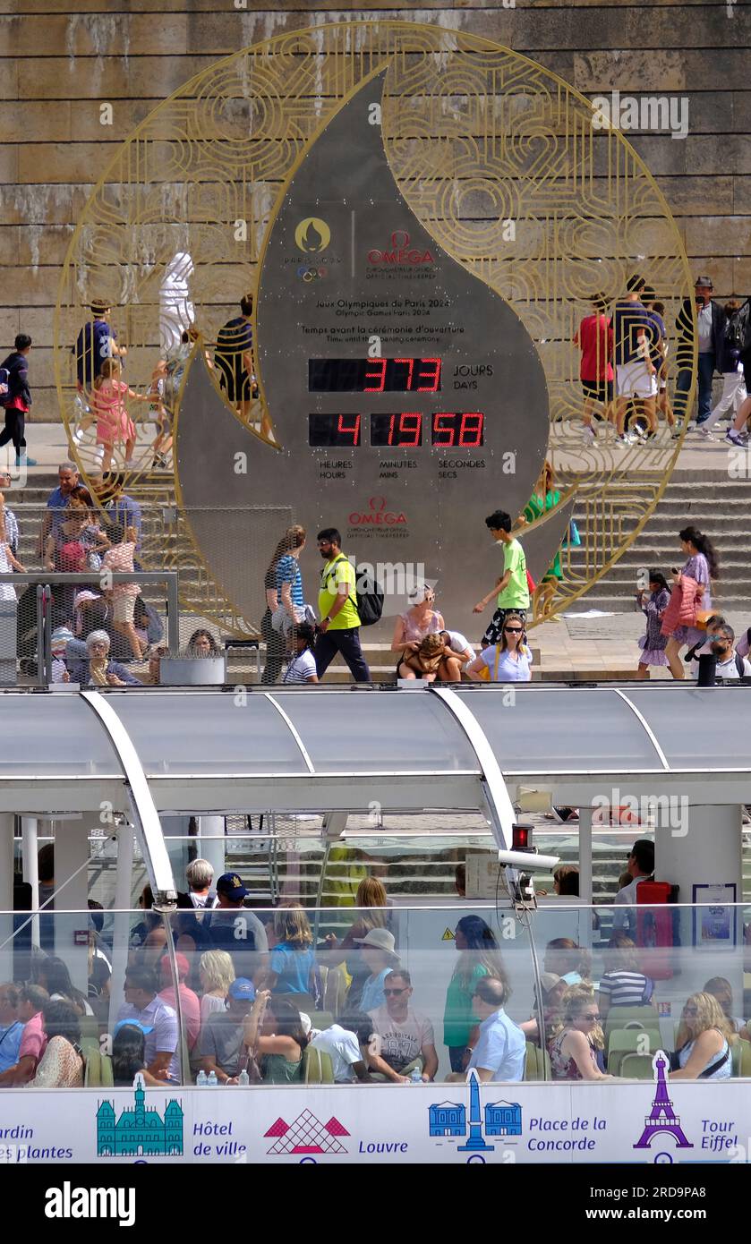 A countdown board appears on the bank of the Seine River near the ...
