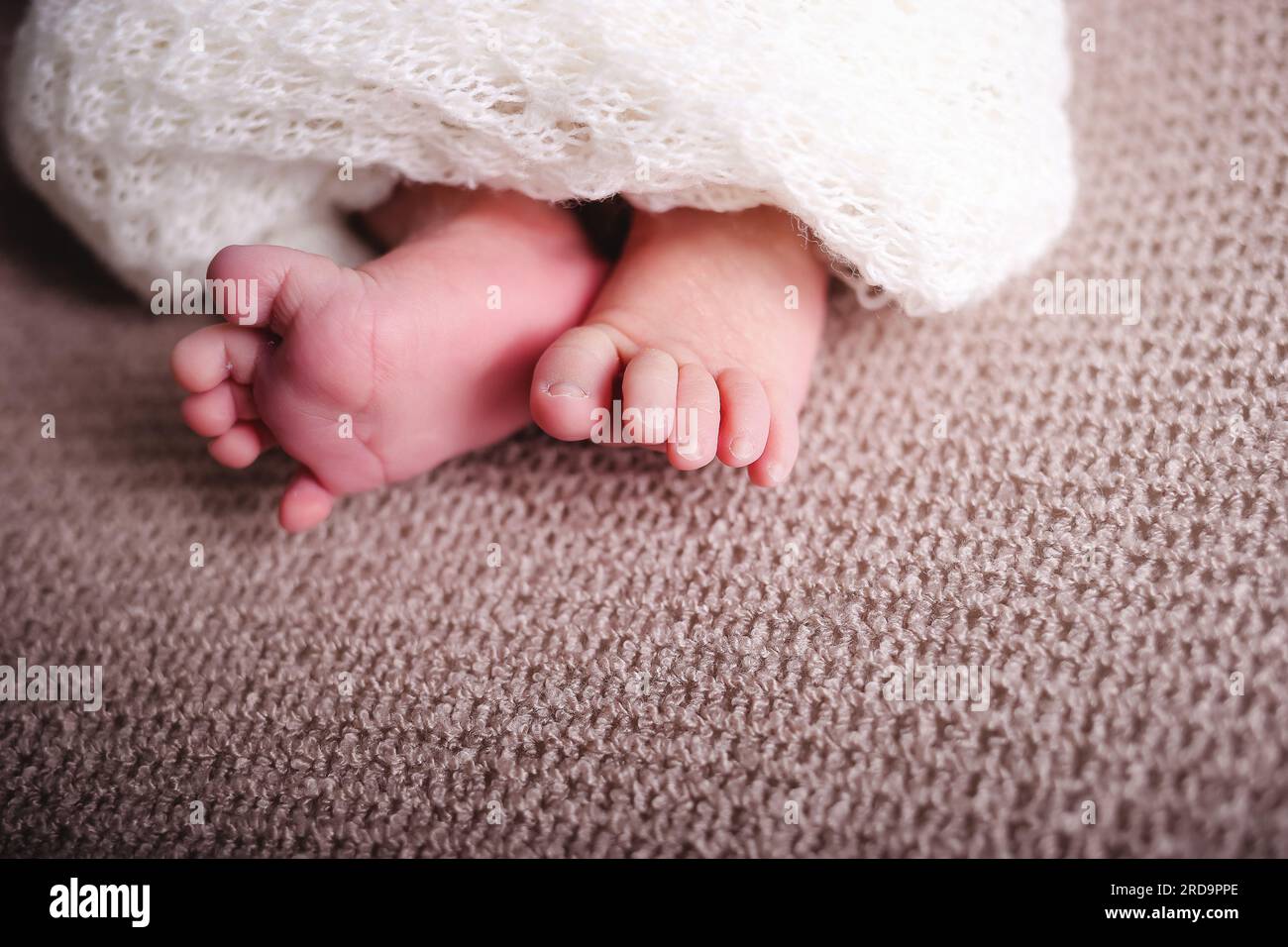 Childcare foot hi-res stock photography and images - Alamy