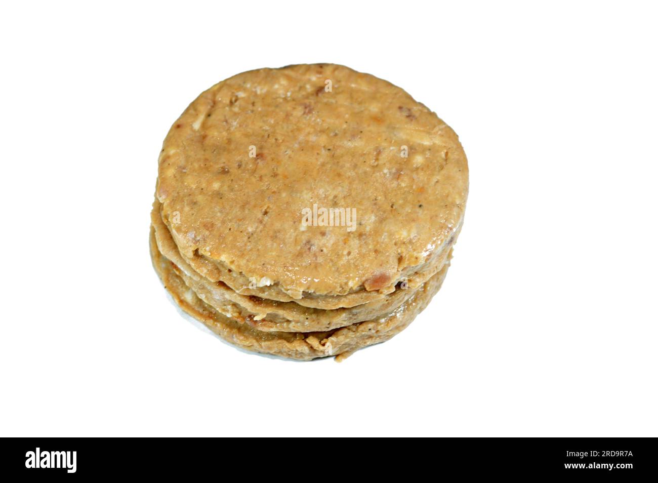 Raw uncooked beef burger ready to be cooked and fried in shallow oil ...