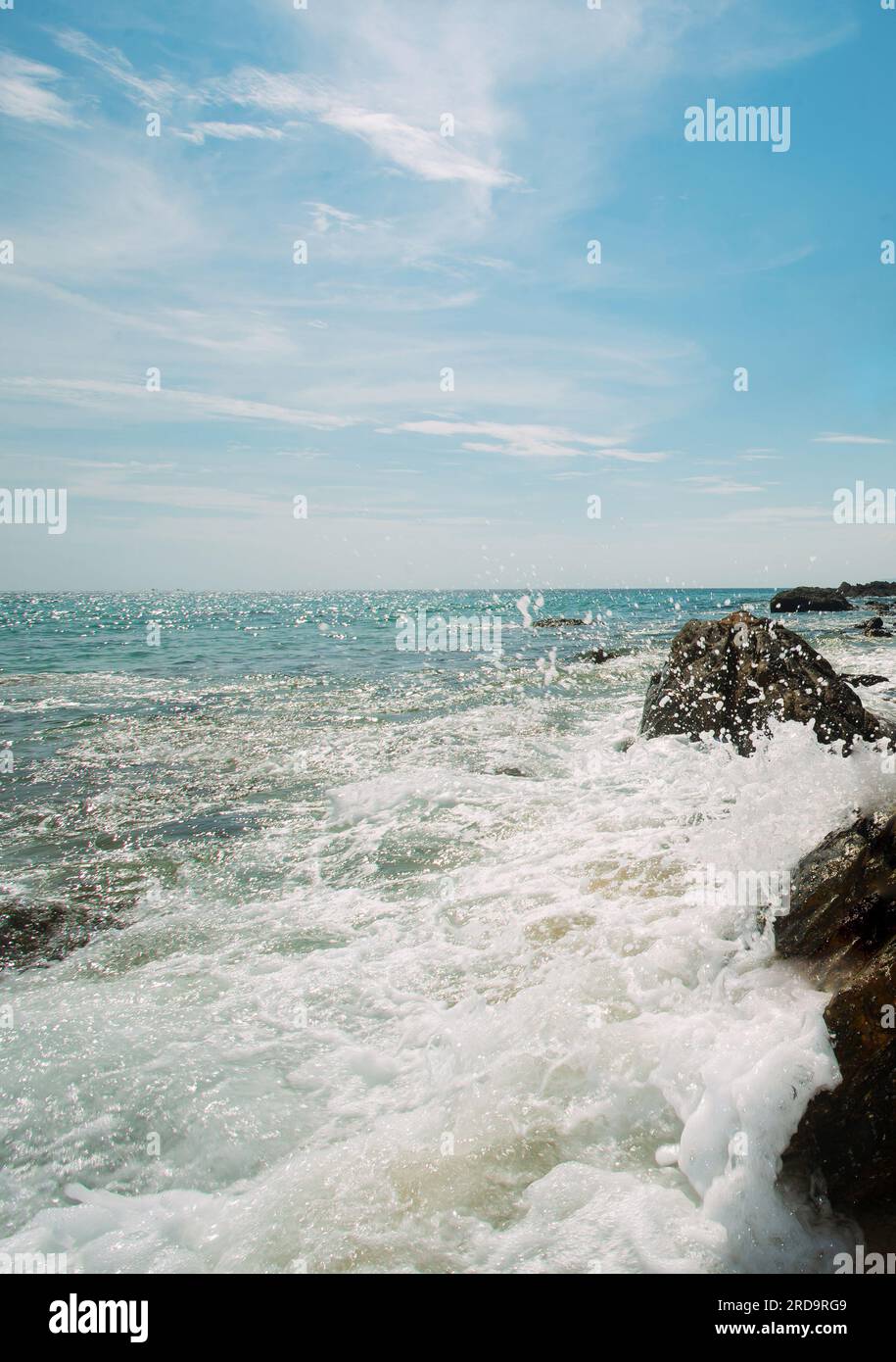 Sea view with big rocks and waves. sea water splashes on rocks ...
