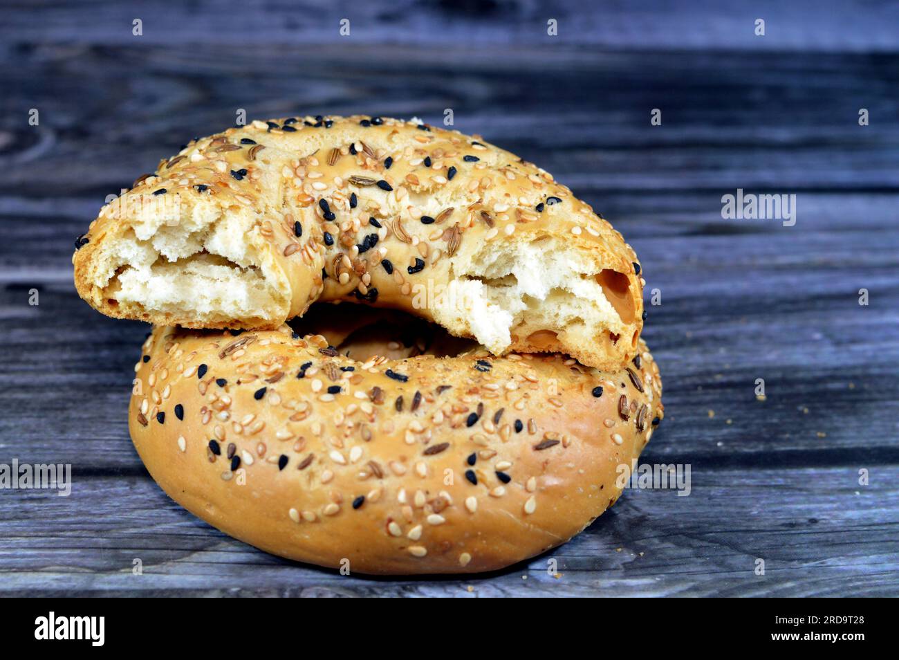 Round baked crispy crackers Breadsticks topped with sesame, fennel ...