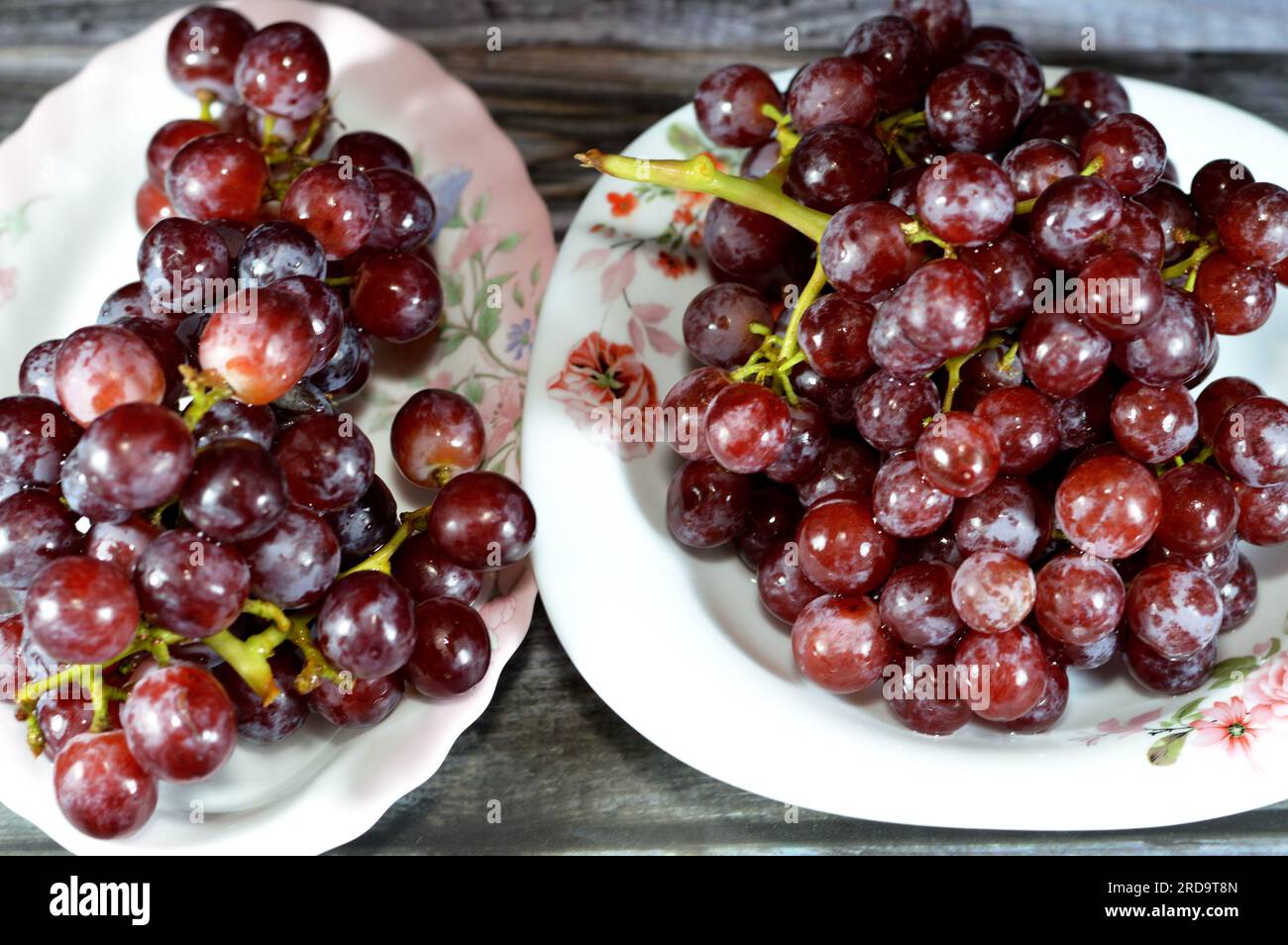 Red grapes, a fruit, botanically a berry of the deciduous woody vines ...